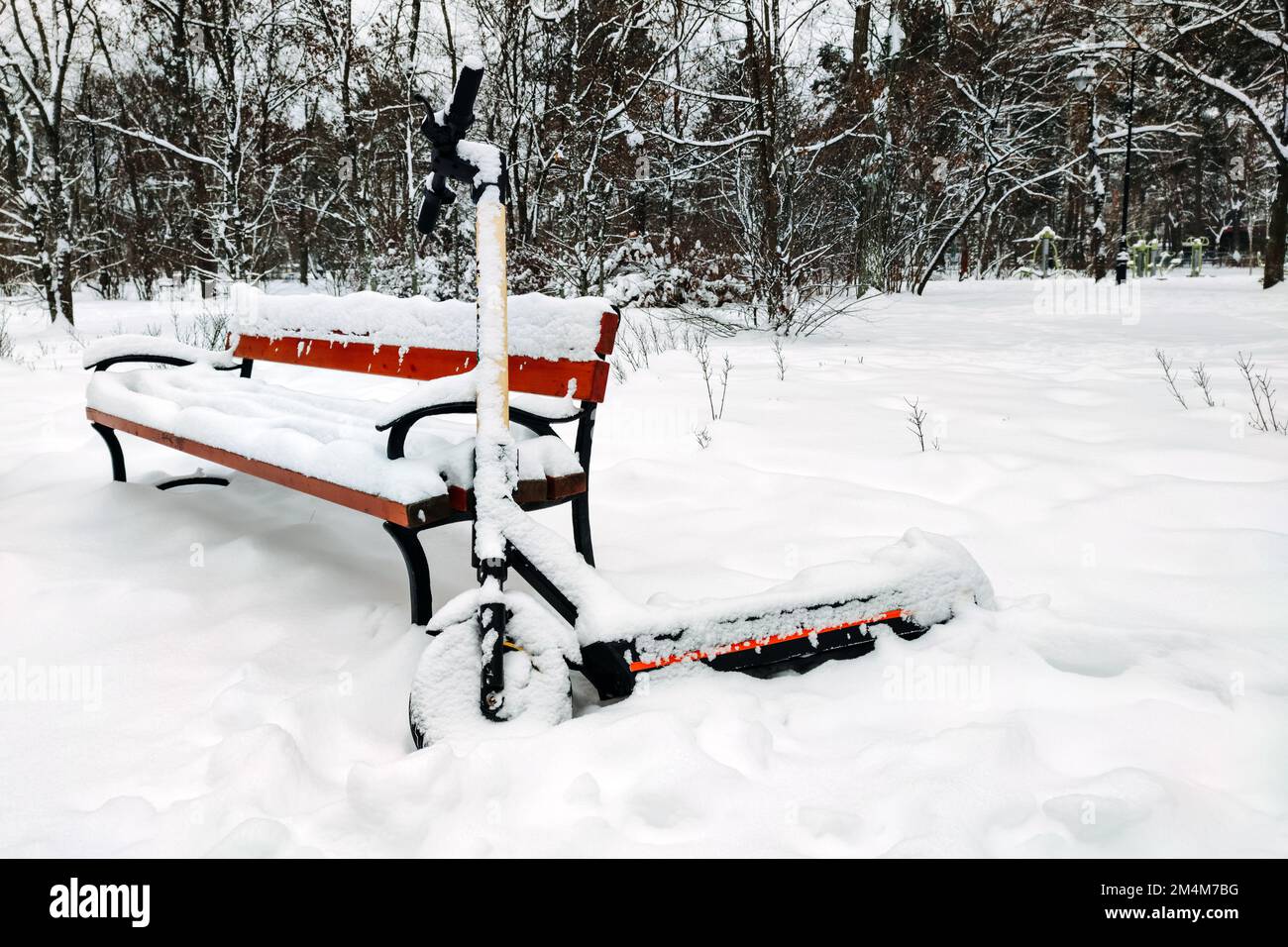 Safely ride electric scooter during winter. Electric scooter covered ...