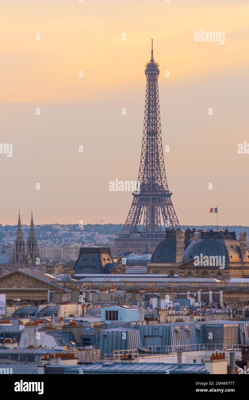 Sunset view of Eiffel Tower with Louvre museum, Notre-Dame cathedral ...