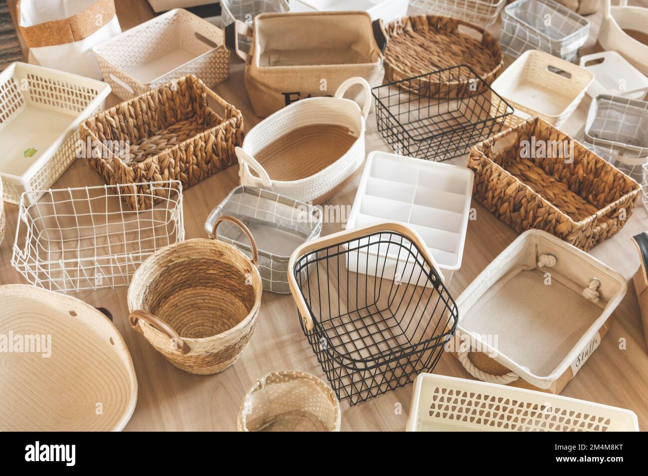 Flat lay of storage boxes; containers and baskets with different sizes ...