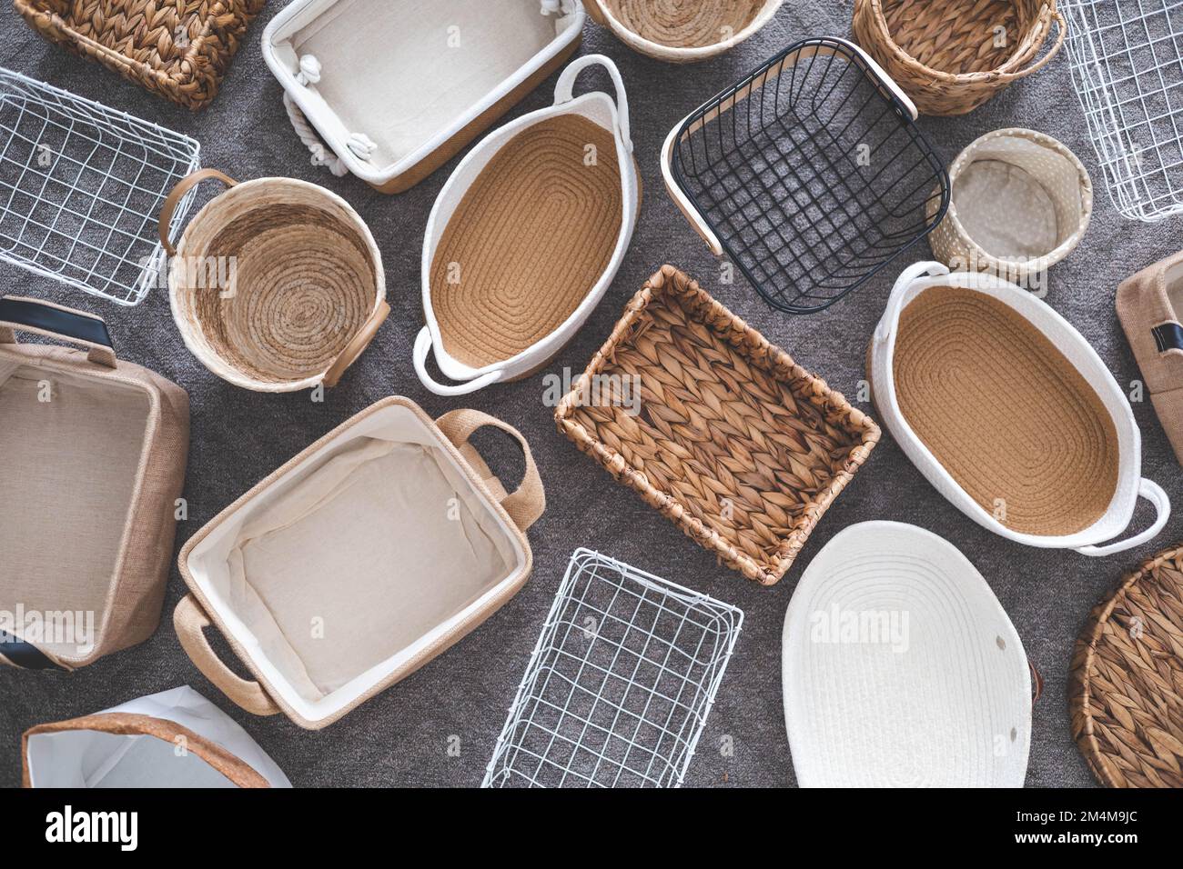 Flat lay of storage boxes; containers and baskets with different sizes ...
