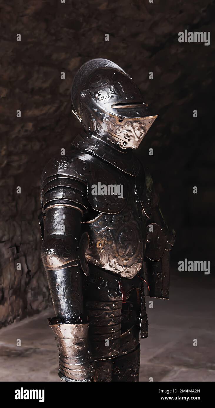 A vertical shot of a knight in the shining armor in a cave Stock Photo ...