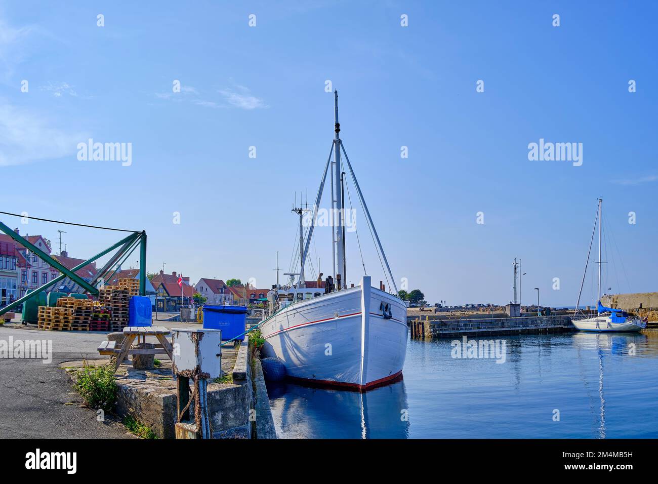 The postboat PETER at the pier of the harbour of Gudhjem, Bornholm ...