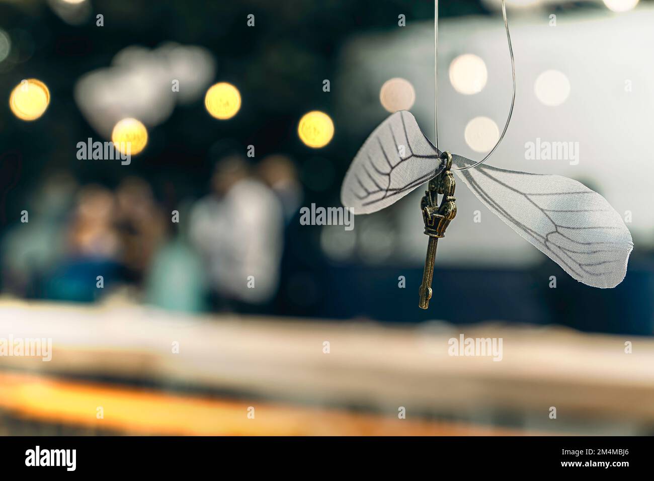 Flying key with dragonfly wings. Party event decoration concept ...
