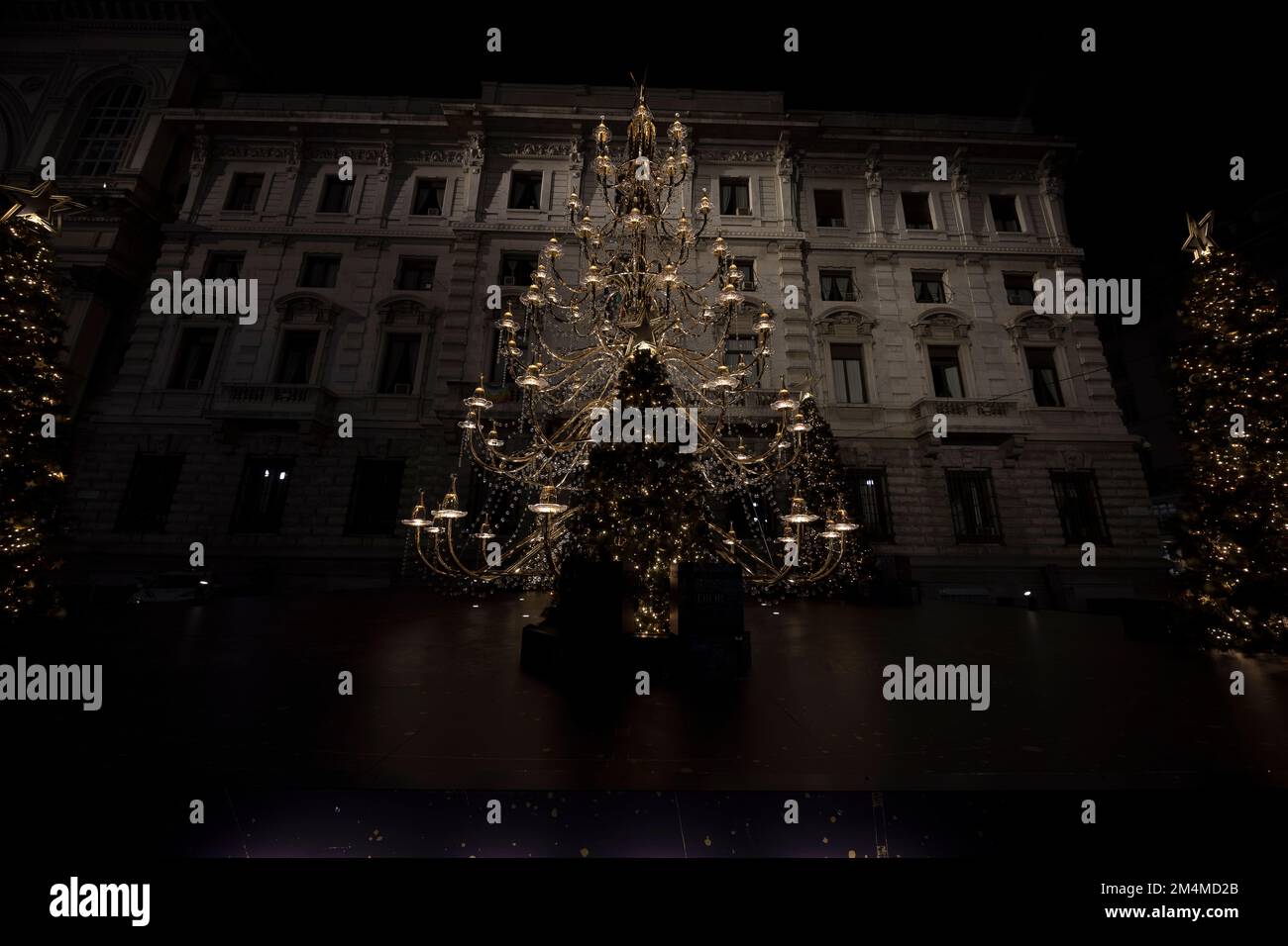 Milan, Italy - December 22, 2022: street view of a Christmas tree in ...