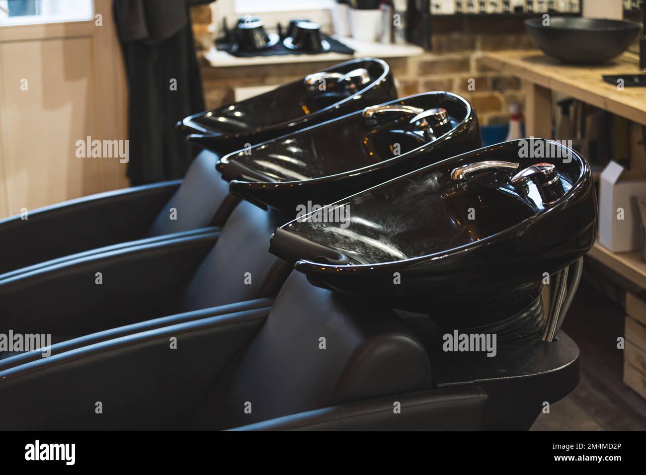 Shampoo chairs for salon. Washing units for hairdresser salon. Black ...