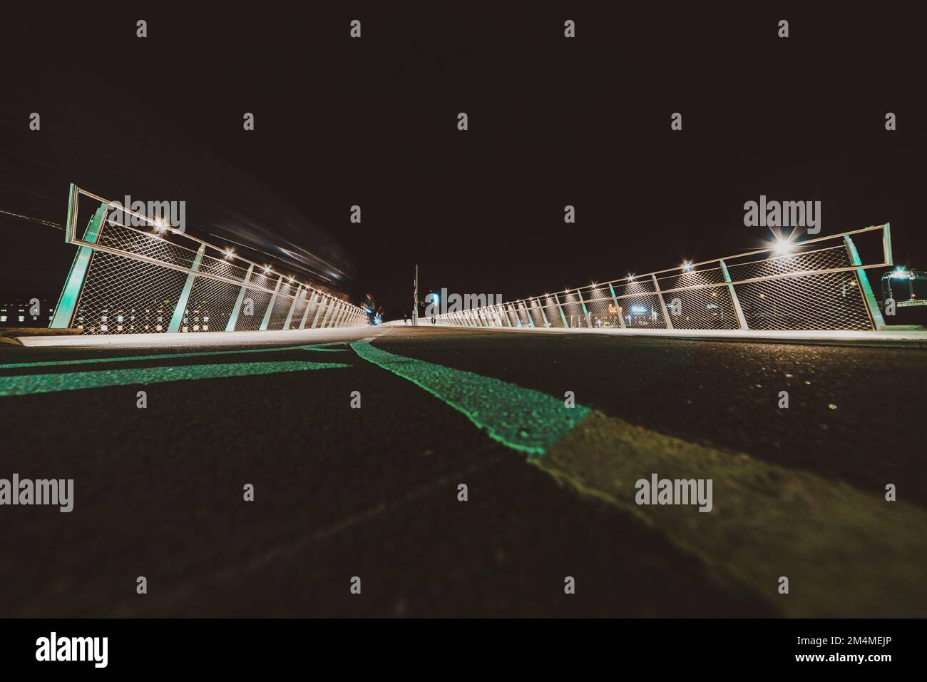illuminated pedestrian bridge at night Stock Photo - Alamy