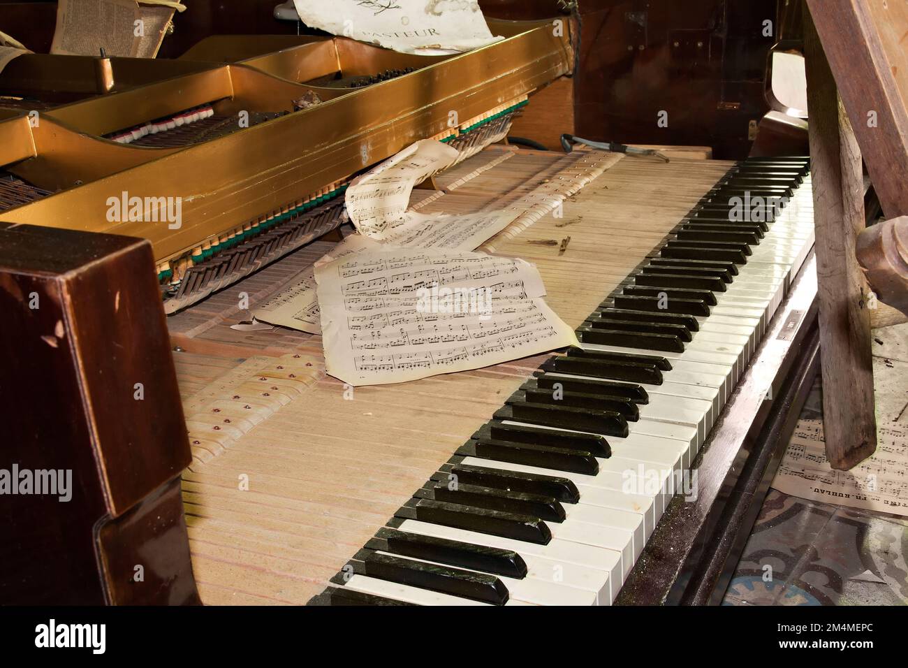 France - July 22.2012: abandoned piano with destroyed music notes in an ...