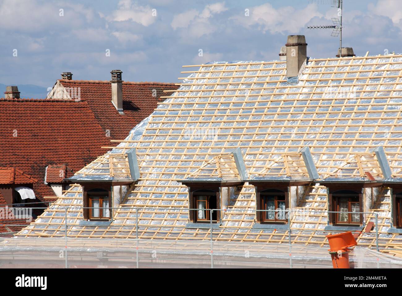 Roof Insulation technique on old house renovation Stock Photo - Alamy