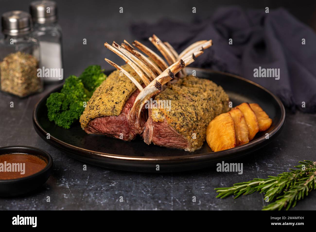 Food photography of roasted lamb, meat, butchery, breaded, garnish ...