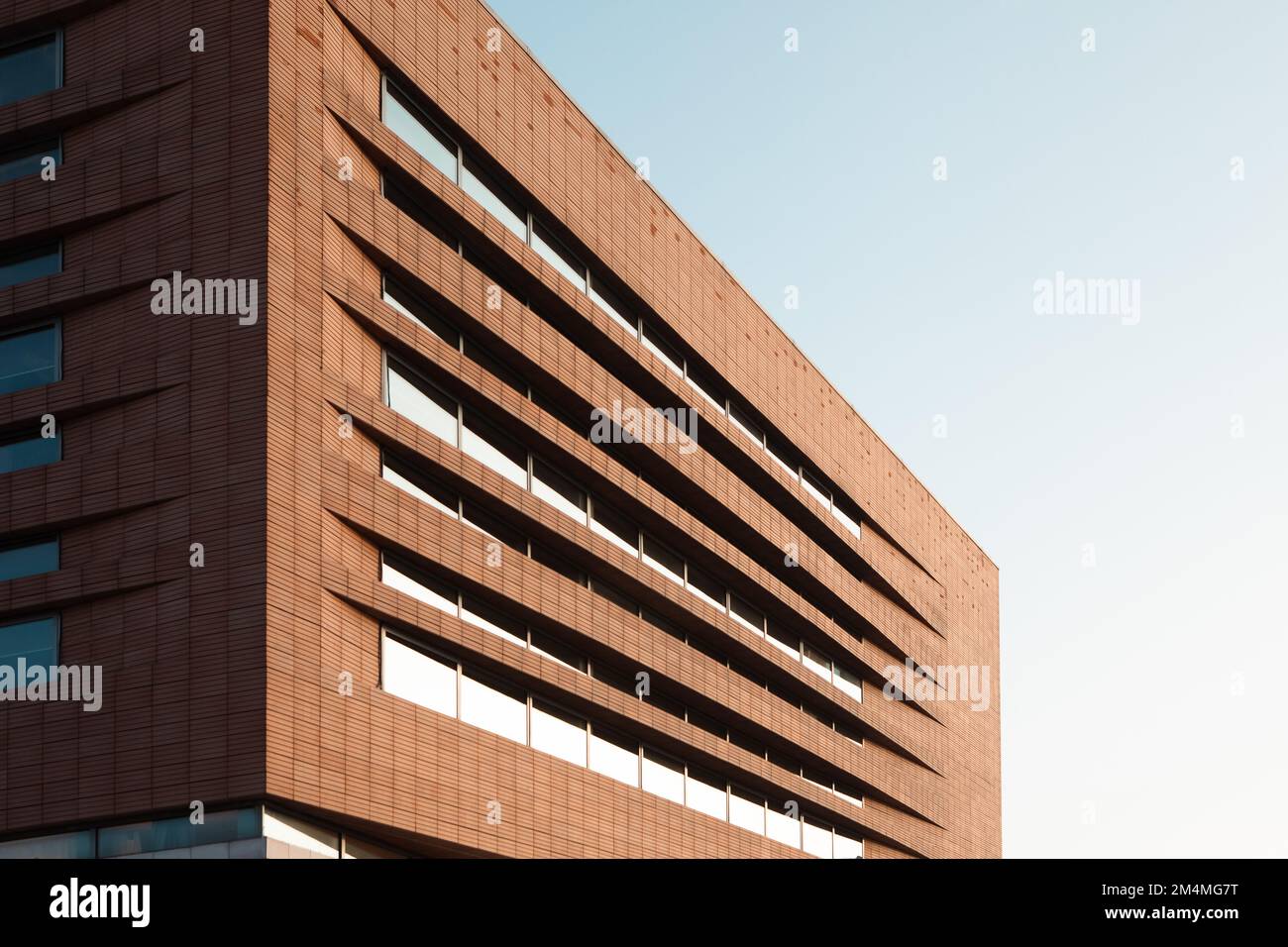 Unique modern brown building exterior wall with stylish design window ...