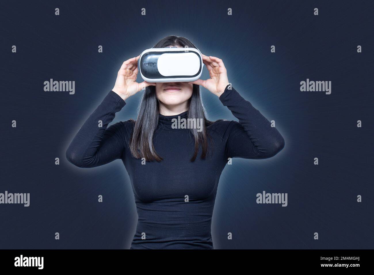 Front view pretty caucasian woman amazed hold virtual reality goggles ...