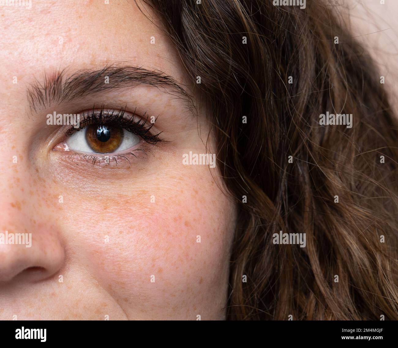Close up front view caucasian beautiful woman cropped face left side ...