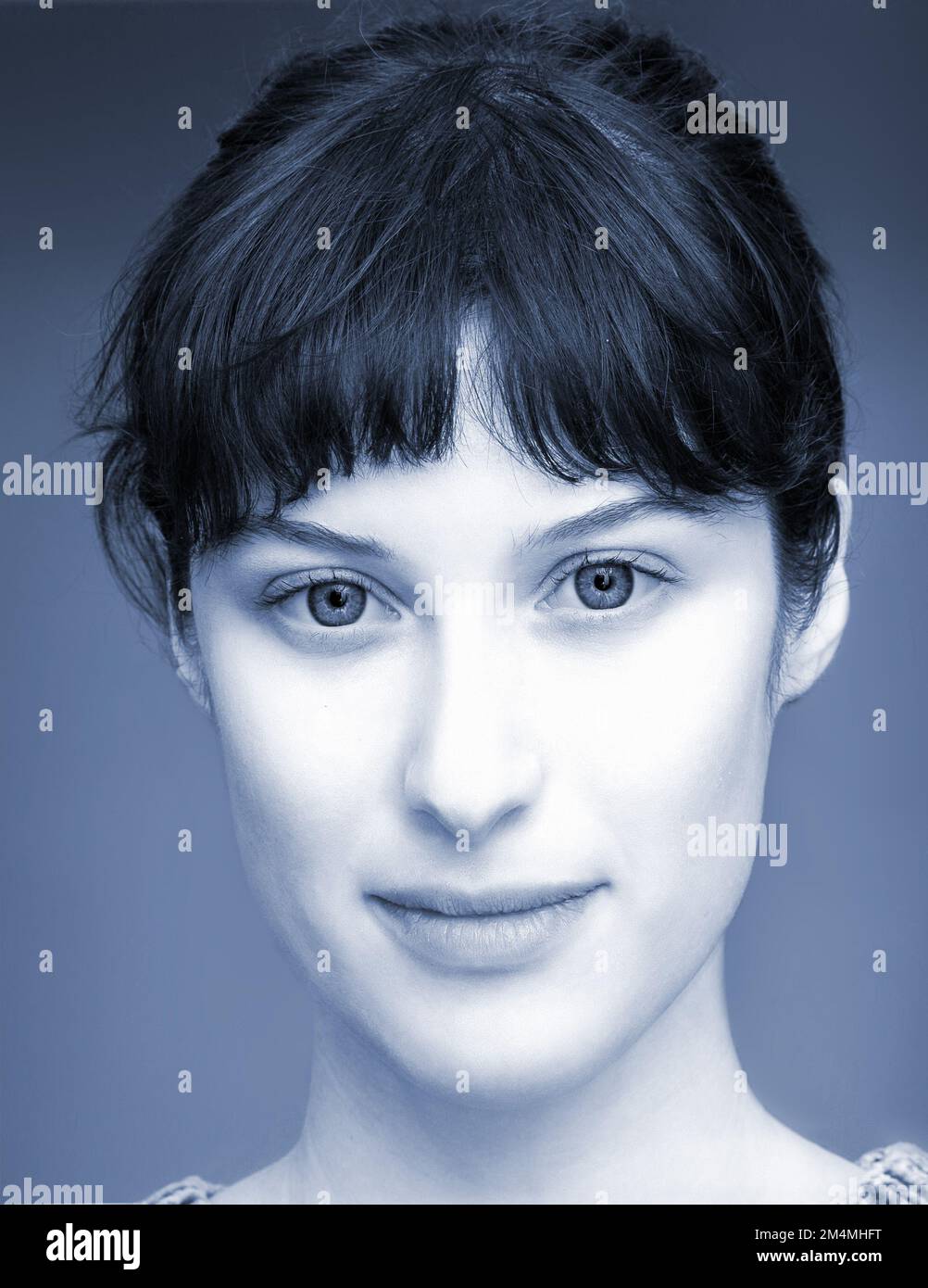 Portrait of monochrome girl with blue toned, death hair, dark eyes and ...