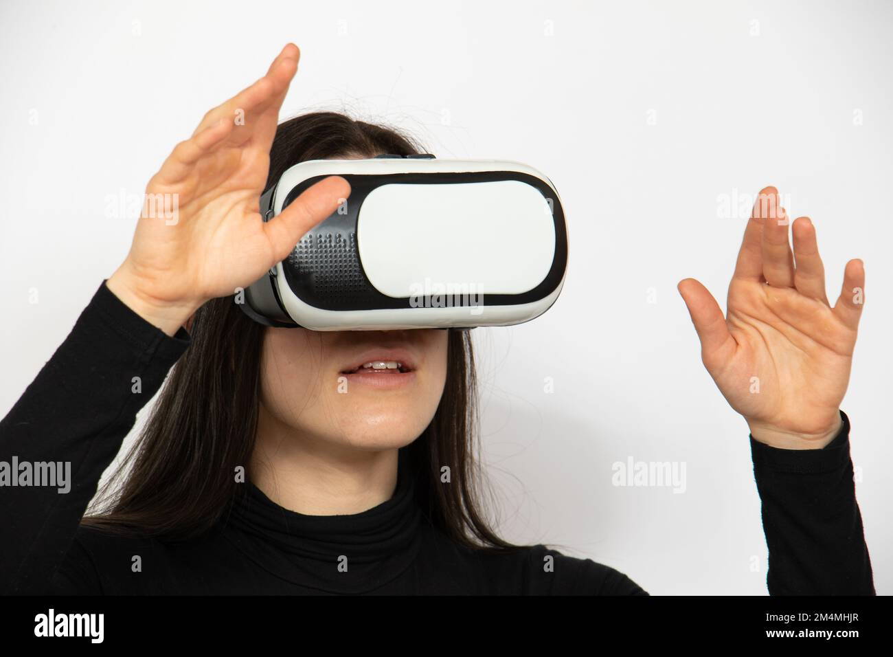 Caucasian woman portrait with virtual reality goggles on face. Studio ...