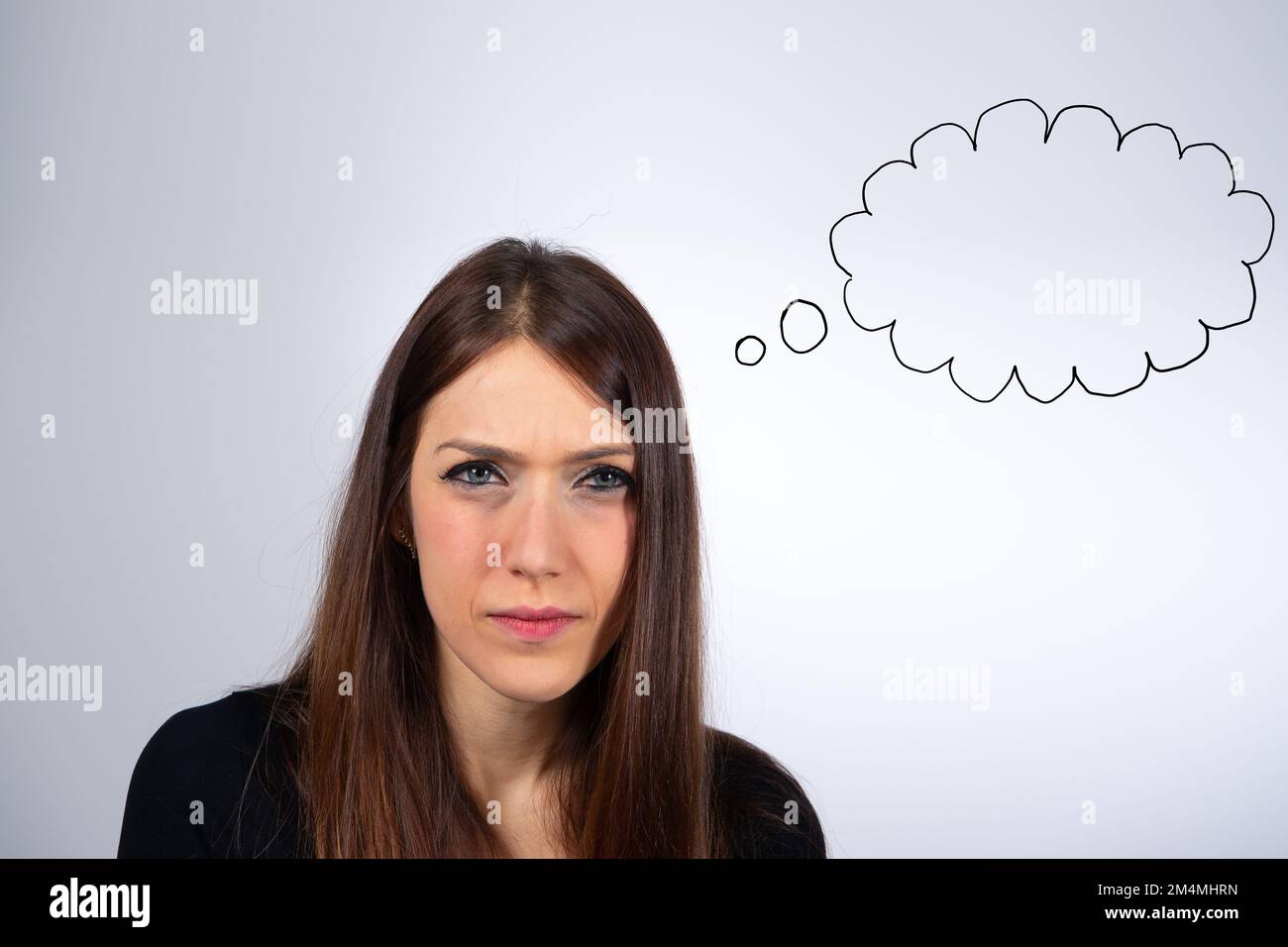 Face of a worried thinking girl with bubbles of a comic beside. Tense ...