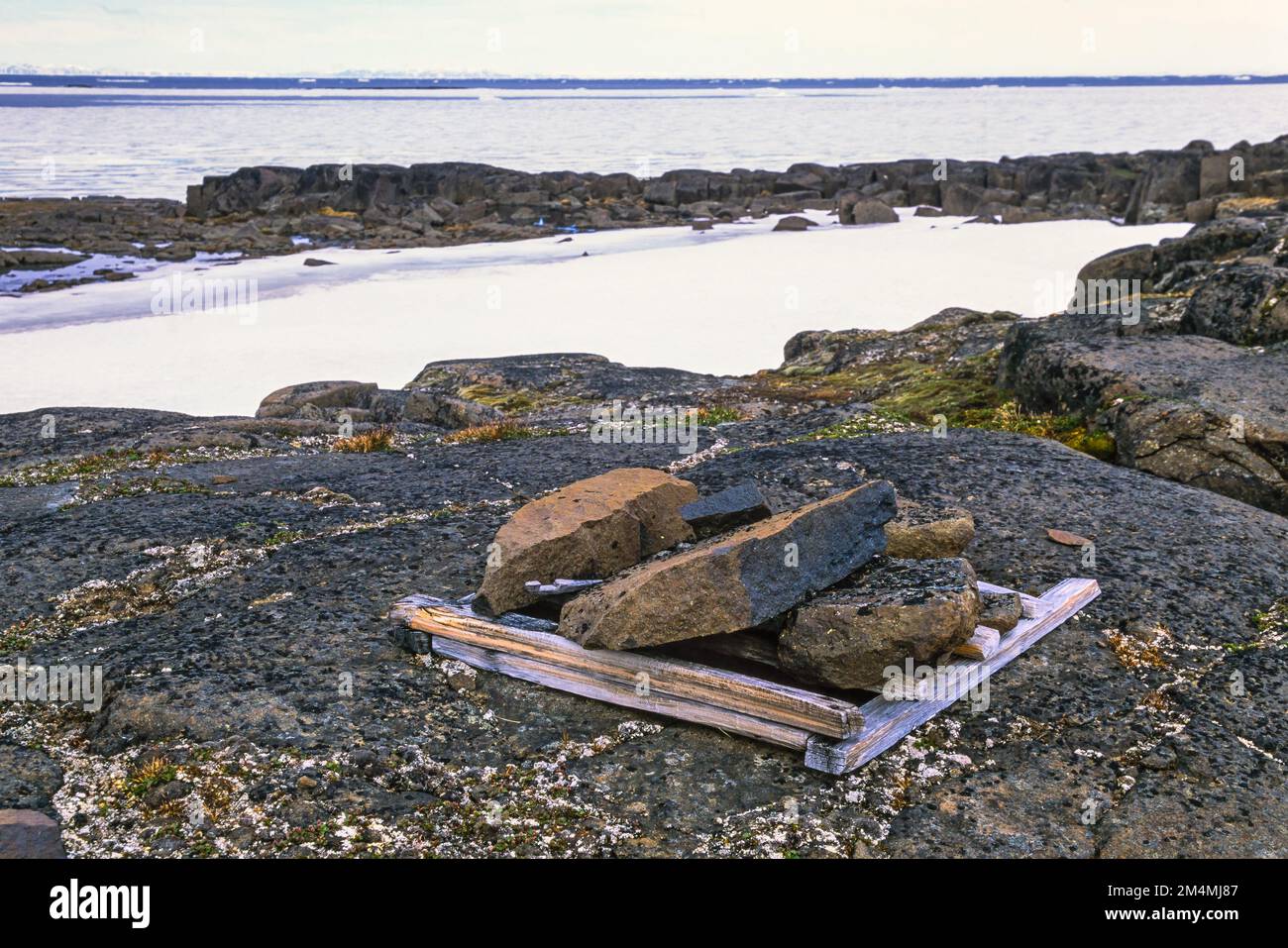 Deadfall trap in arctic landscape Stock Photo - Alamy