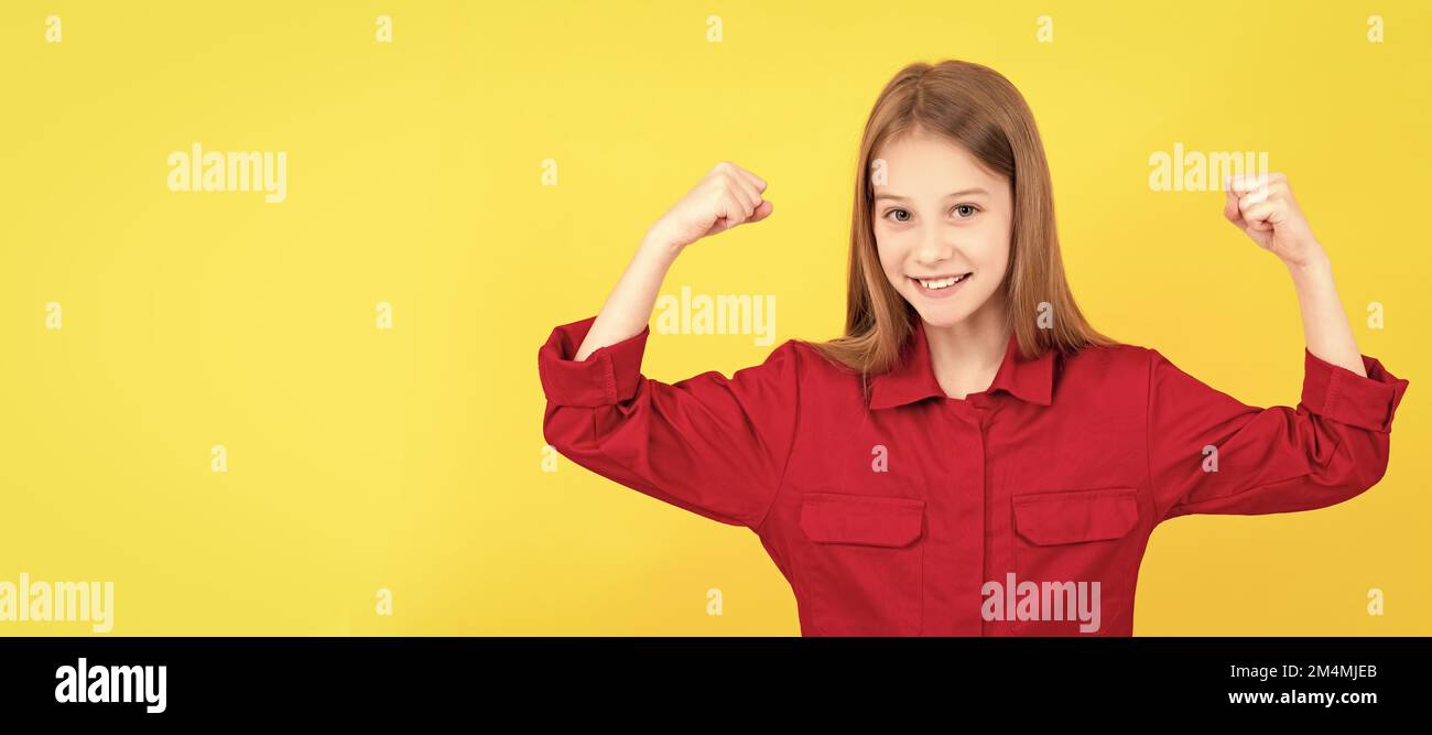 glad teen girl with cute face on yellow background. Child face ...