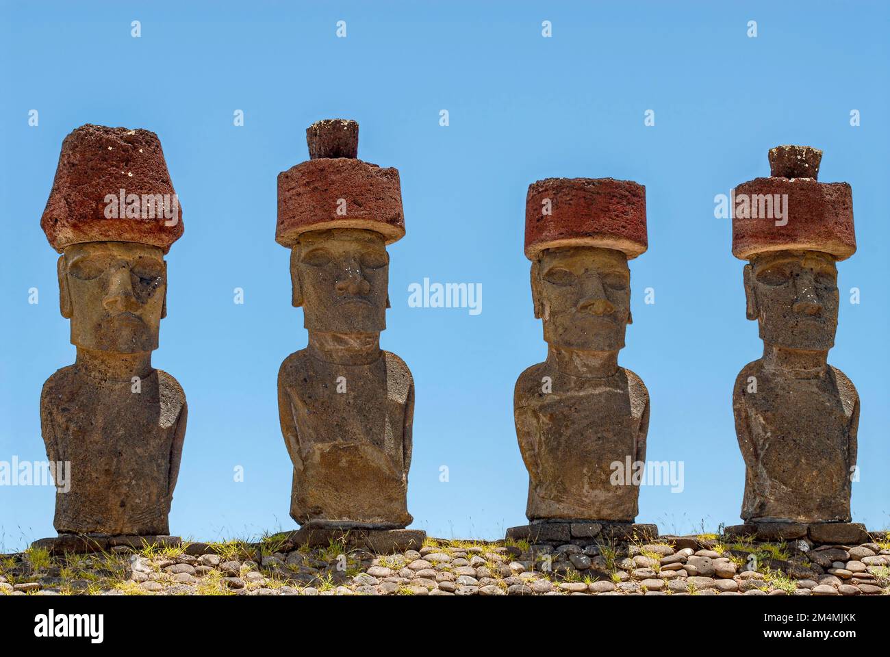 Row of Moai Status with pukao headdress of the Ahu Nao-Nao at Anakena ...