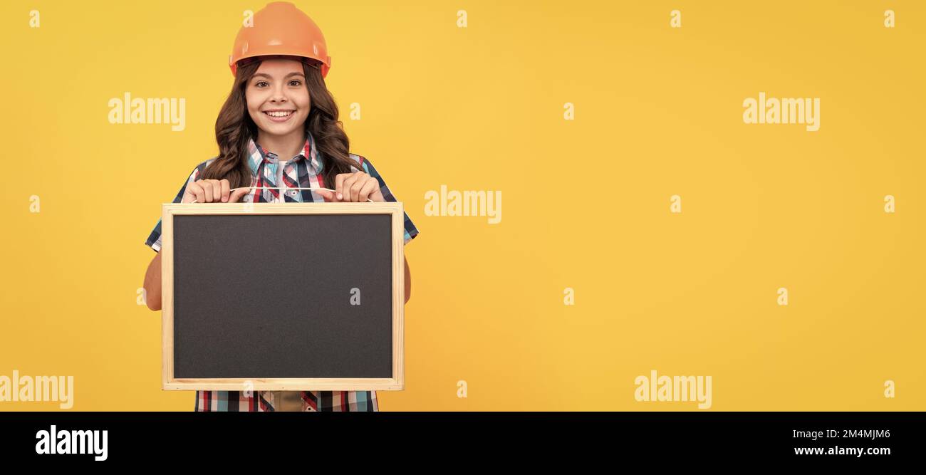 cheerful teen girl laborer hold blackboard. child advertising labor day ...