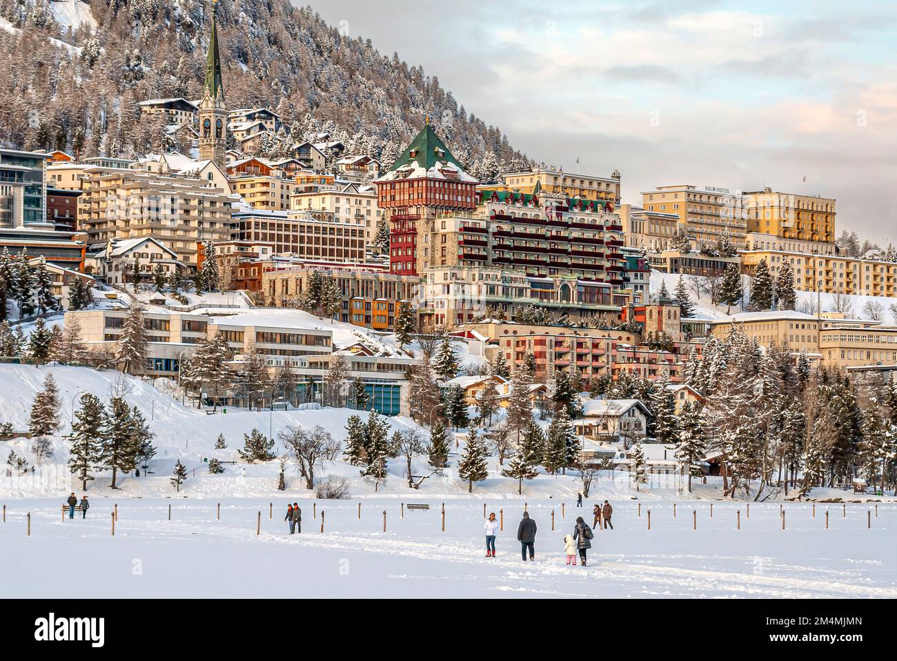 Town centre of St.Moritz Village and the Lake St.Moritz in Winter ...