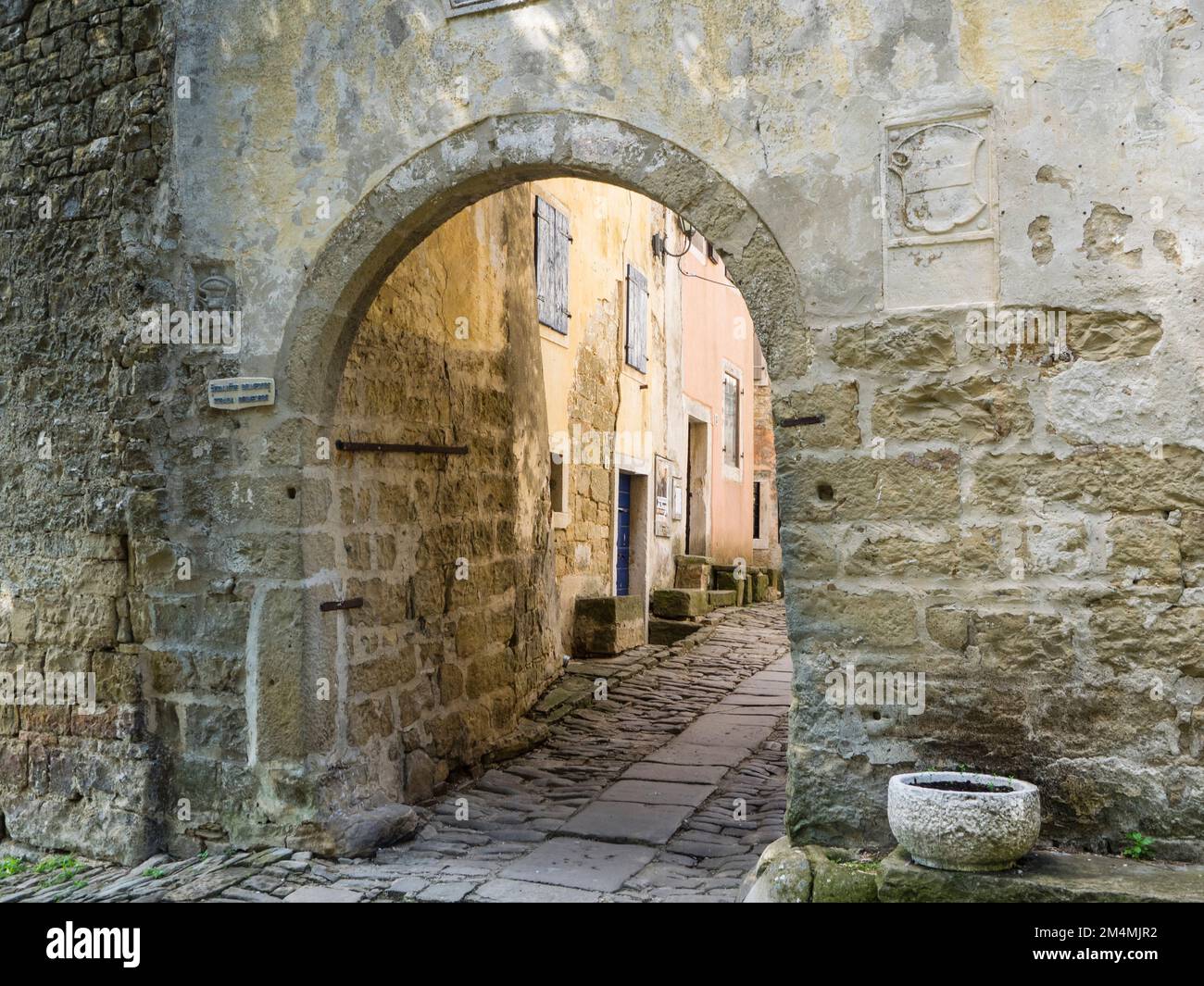 Archway into the hilltop town of Groznjan, Istria, Croatia Stock Photo ...