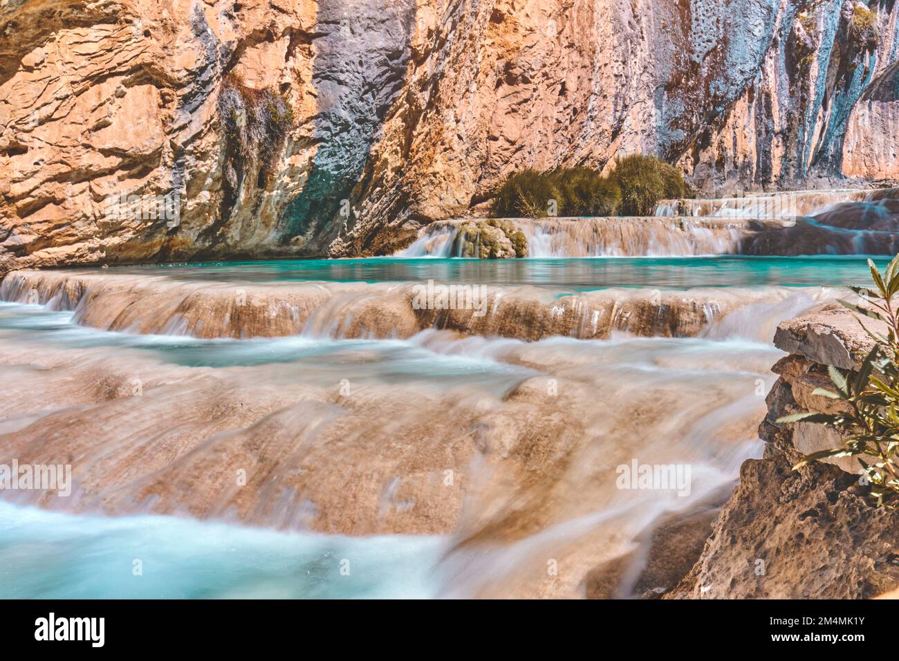 Natural pools of Millpu in Huancaraylla. Turquoise lagoons near ...