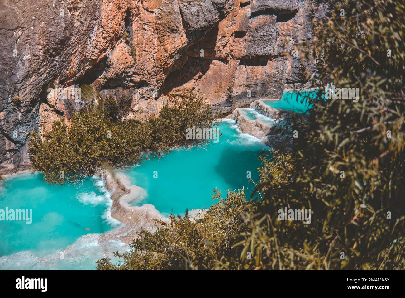 Natural pools of Millpu in Huancaraylla. Turquoise lagoons near ...