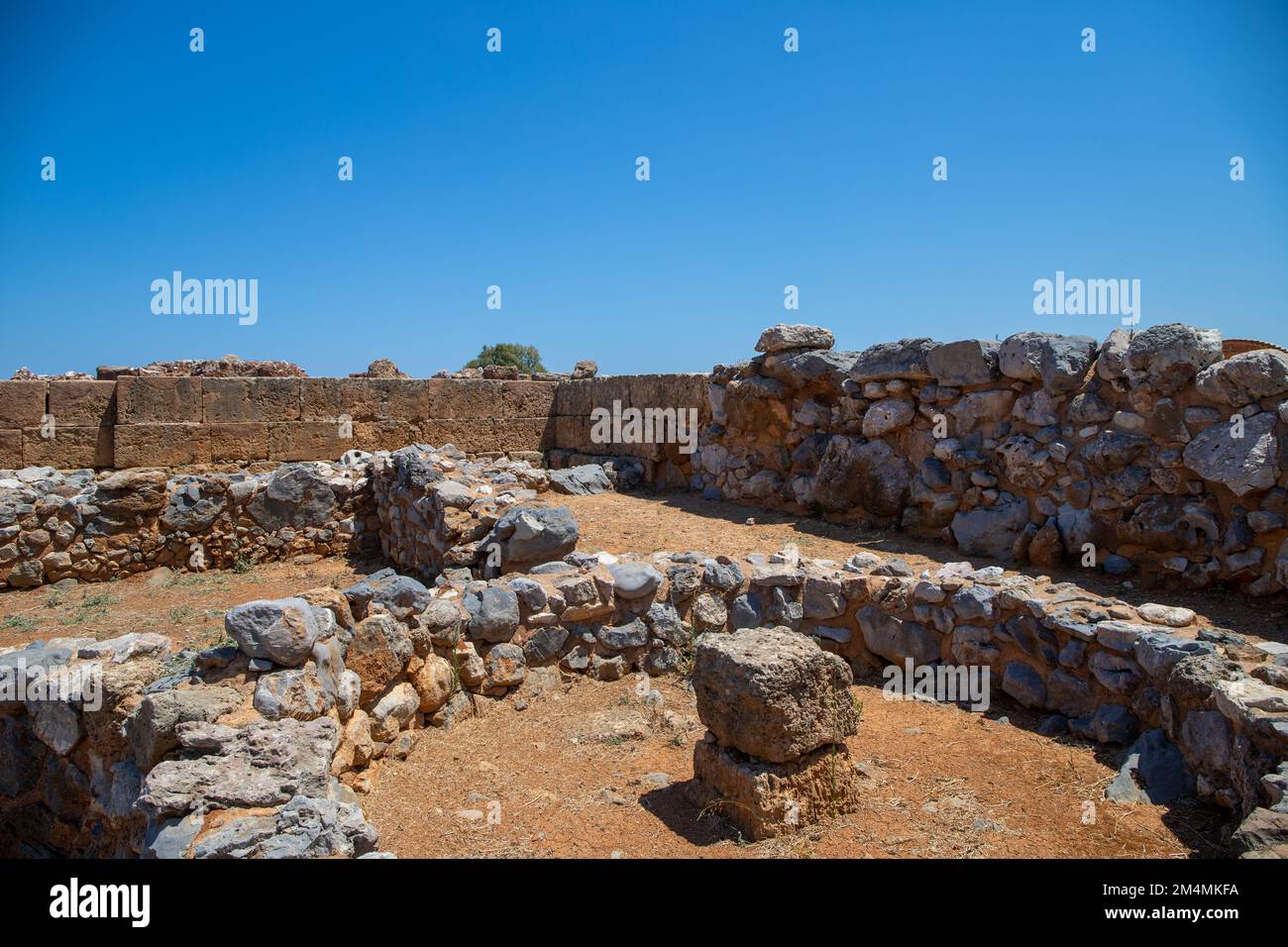 Ancient archaeological site in Crete with stone ruins. High quality ...