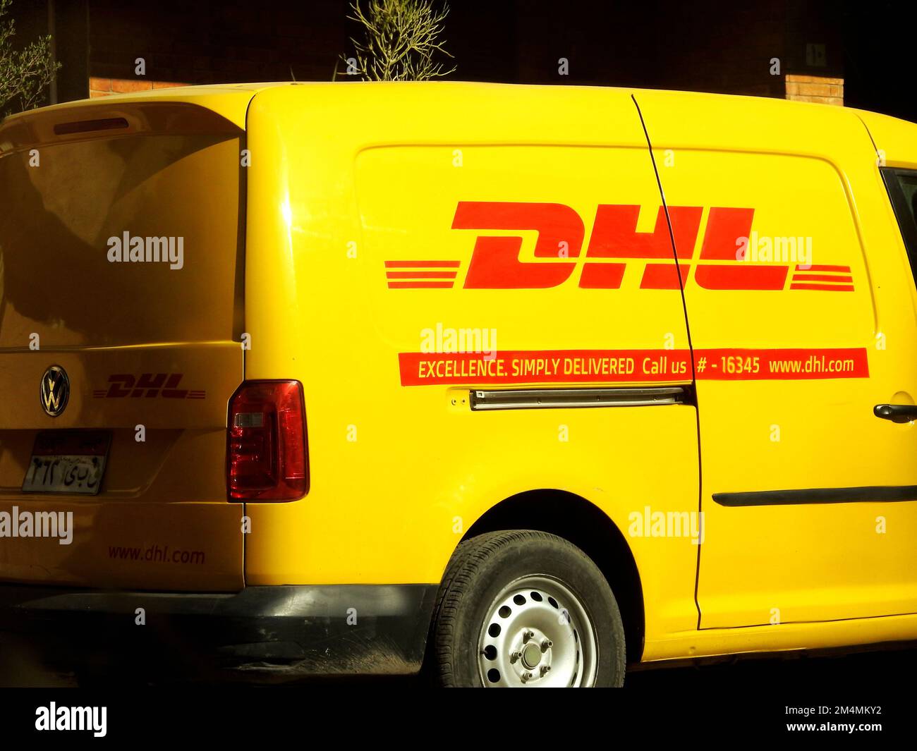 Cairo, Egypt, December 7 2022: DHL truck delivering a package, DHL is ...