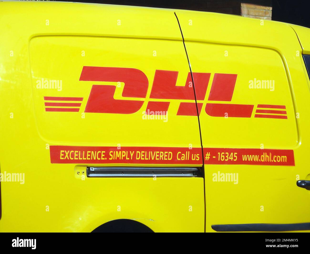 Cairo, Egypt, December 7 2022: DHL truck delivering a package, DHL is ...