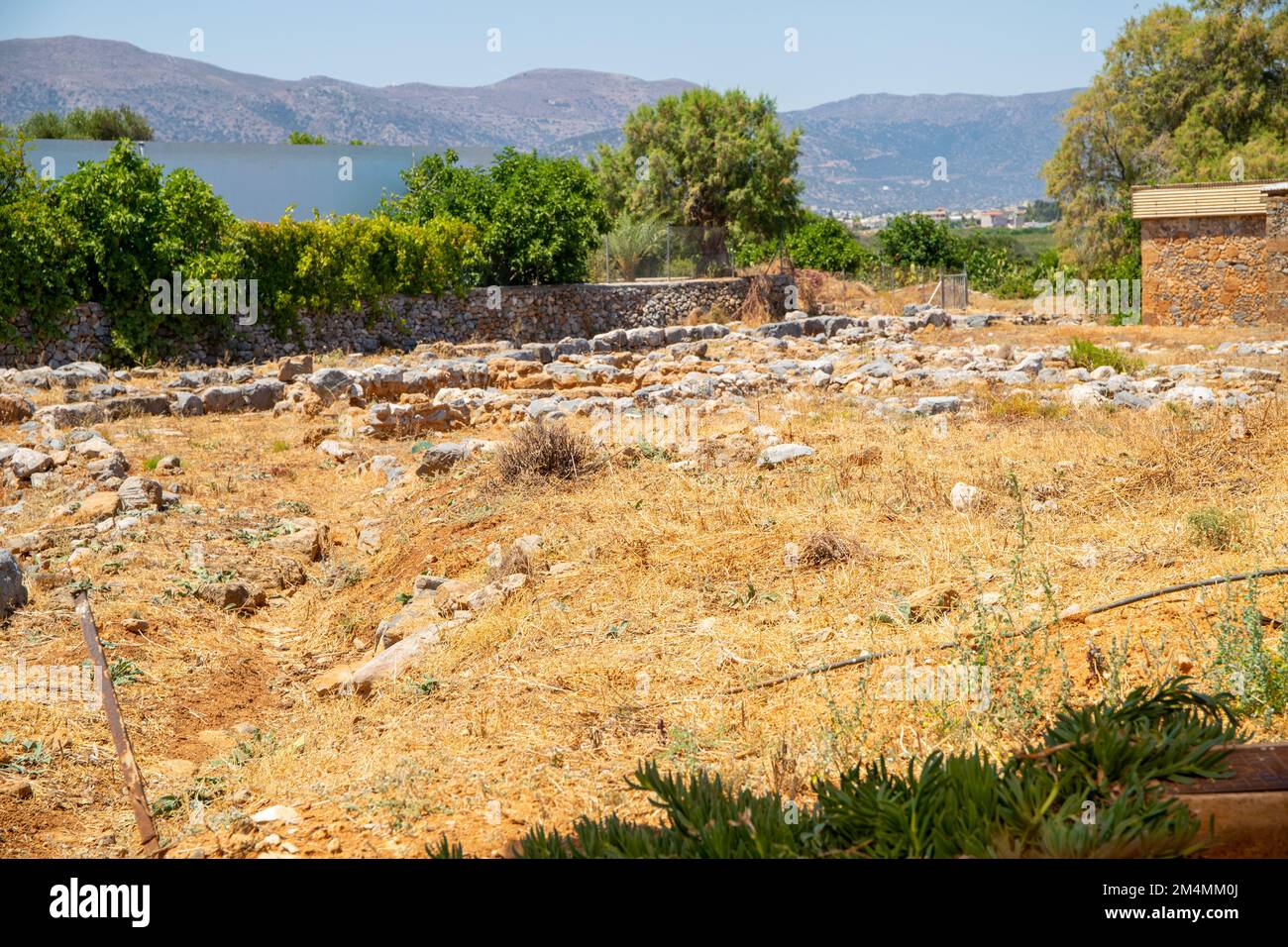 Ancient archaeological site in Crete with stone ruins. High quality ...