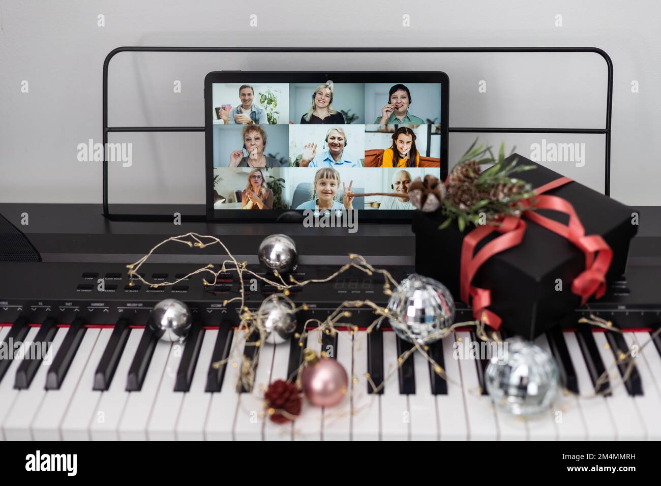 Christmas video call tablet. synthesizer, piano keys Stock Photo - Alamy