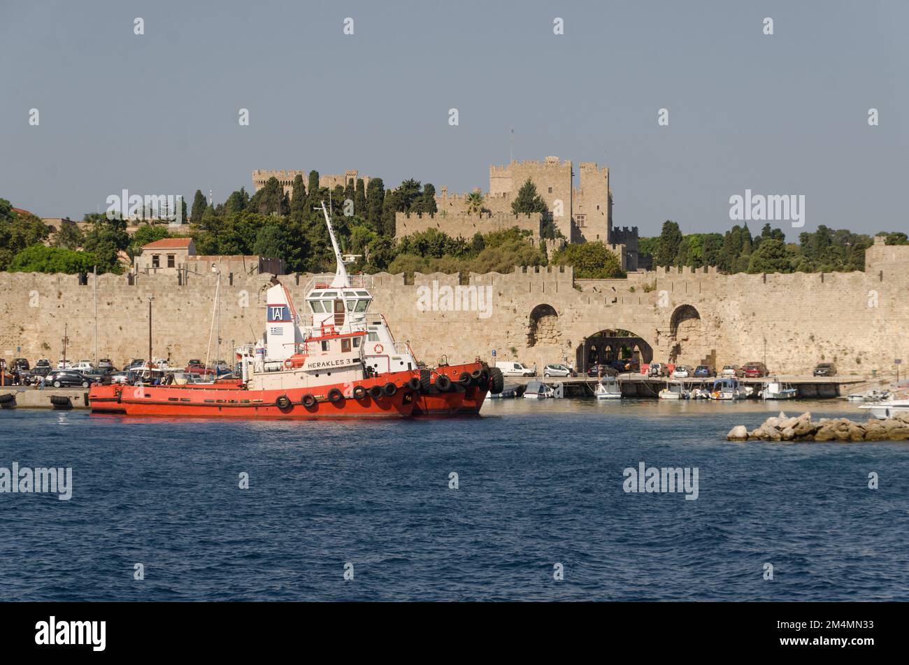 Tug Boat Agains the Walls of Rethymno Castle, Greece Stock Photo - Alamy