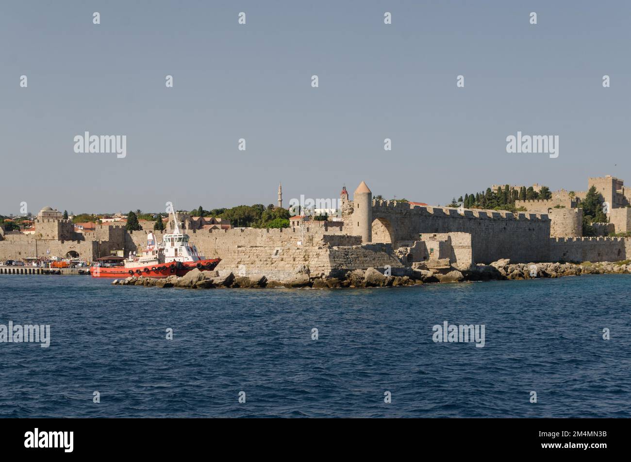 Tug Boat Agains the Walls of Rethymno Castle, Greece Stock Photo - Alamy