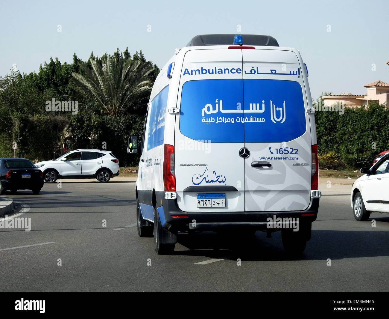 Cairo, Egypt, December 12 2022: An ambulance responding to an emergency ...