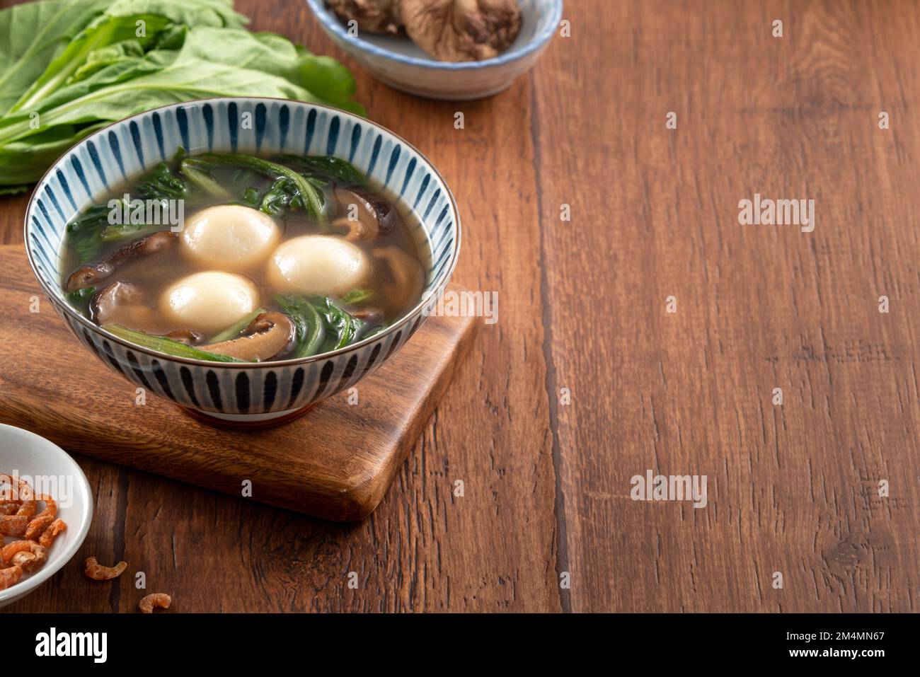 Eating big tangyuan yuanxiao (tang yuan, glutinous rice dumpling balls ...