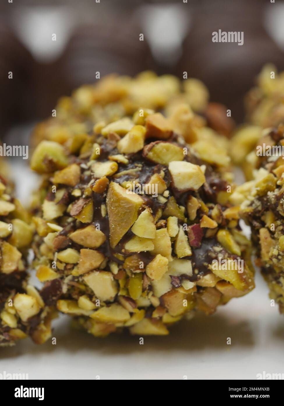 handmade pralines from chocolate on display Stock Photo - Alamy