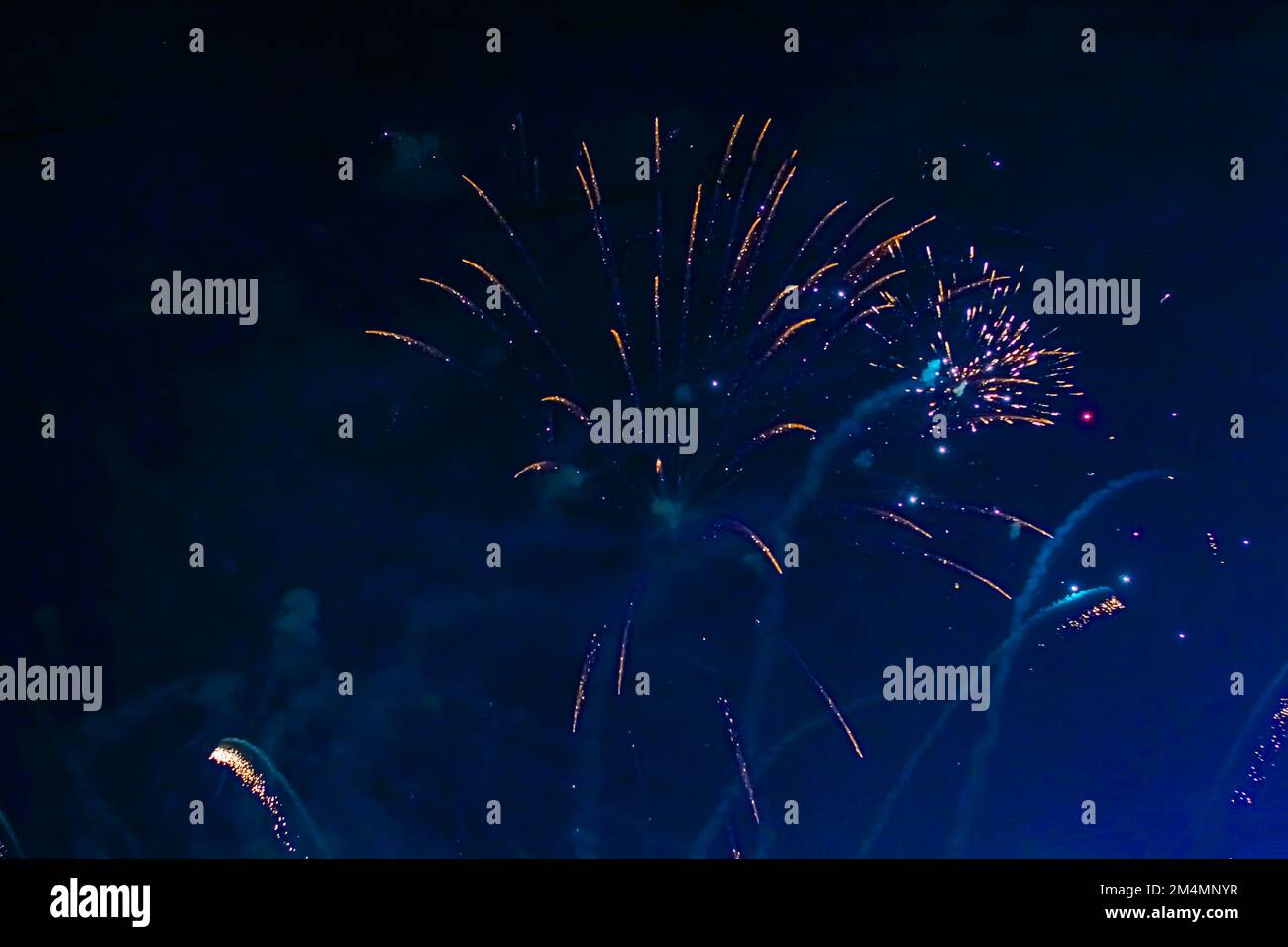 Bright, beautiful blue fireworks in the night sky. High quality photo ...