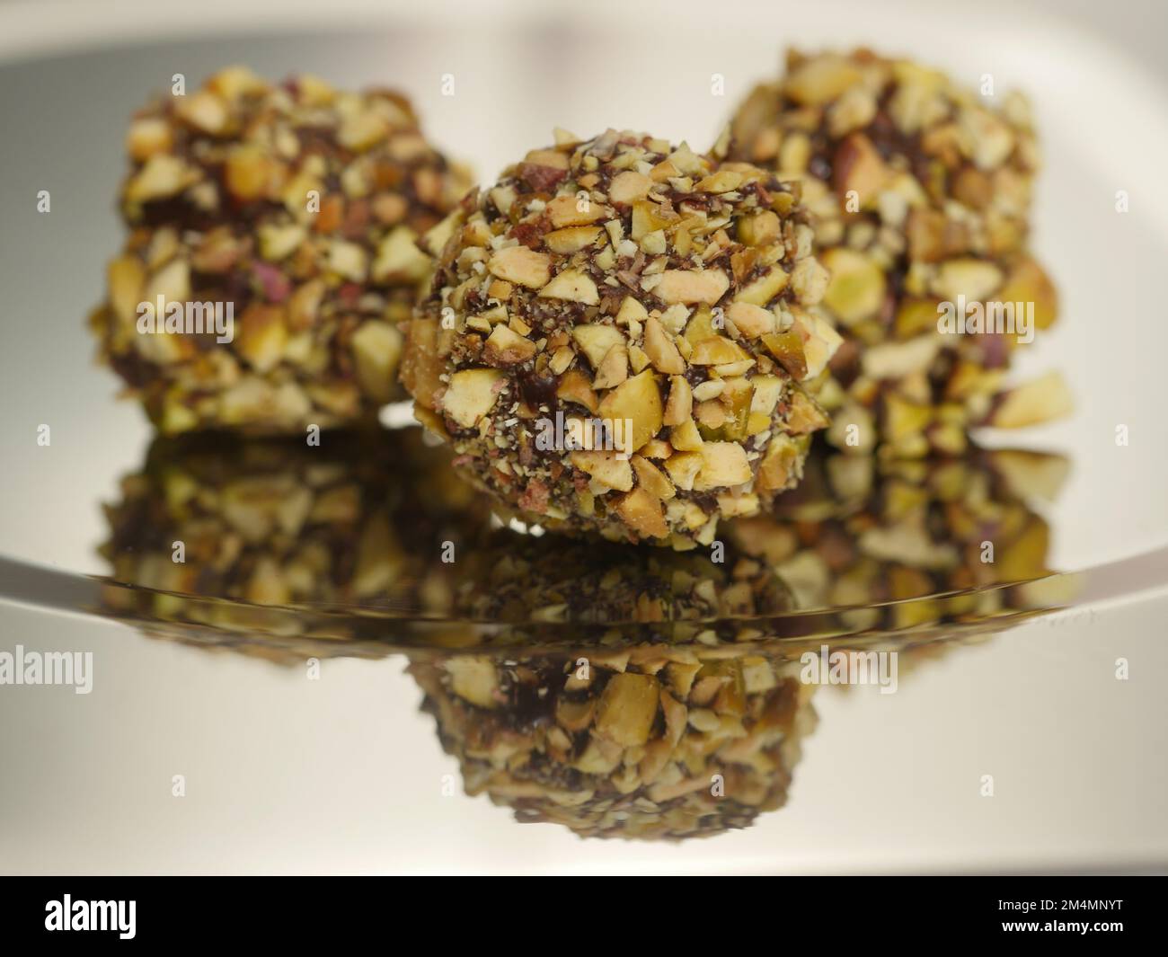 handmade pralines from chocolate on display Stock Photo - Alamy