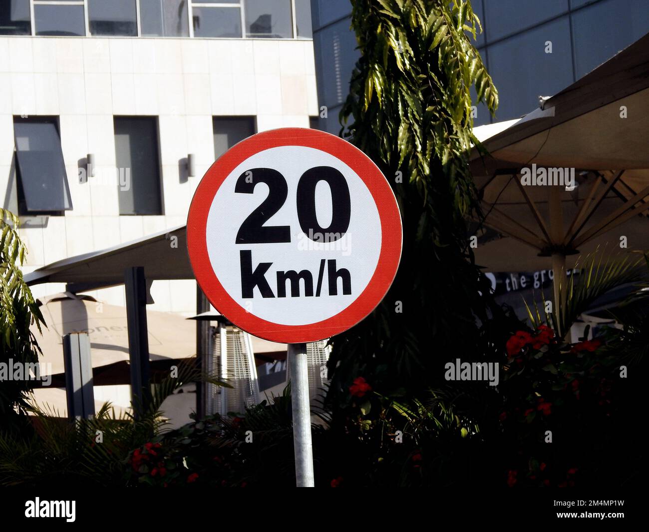 Cairo, Egypt, December 10 2022: A road sign of 20 KMH twenty Kilometers ...