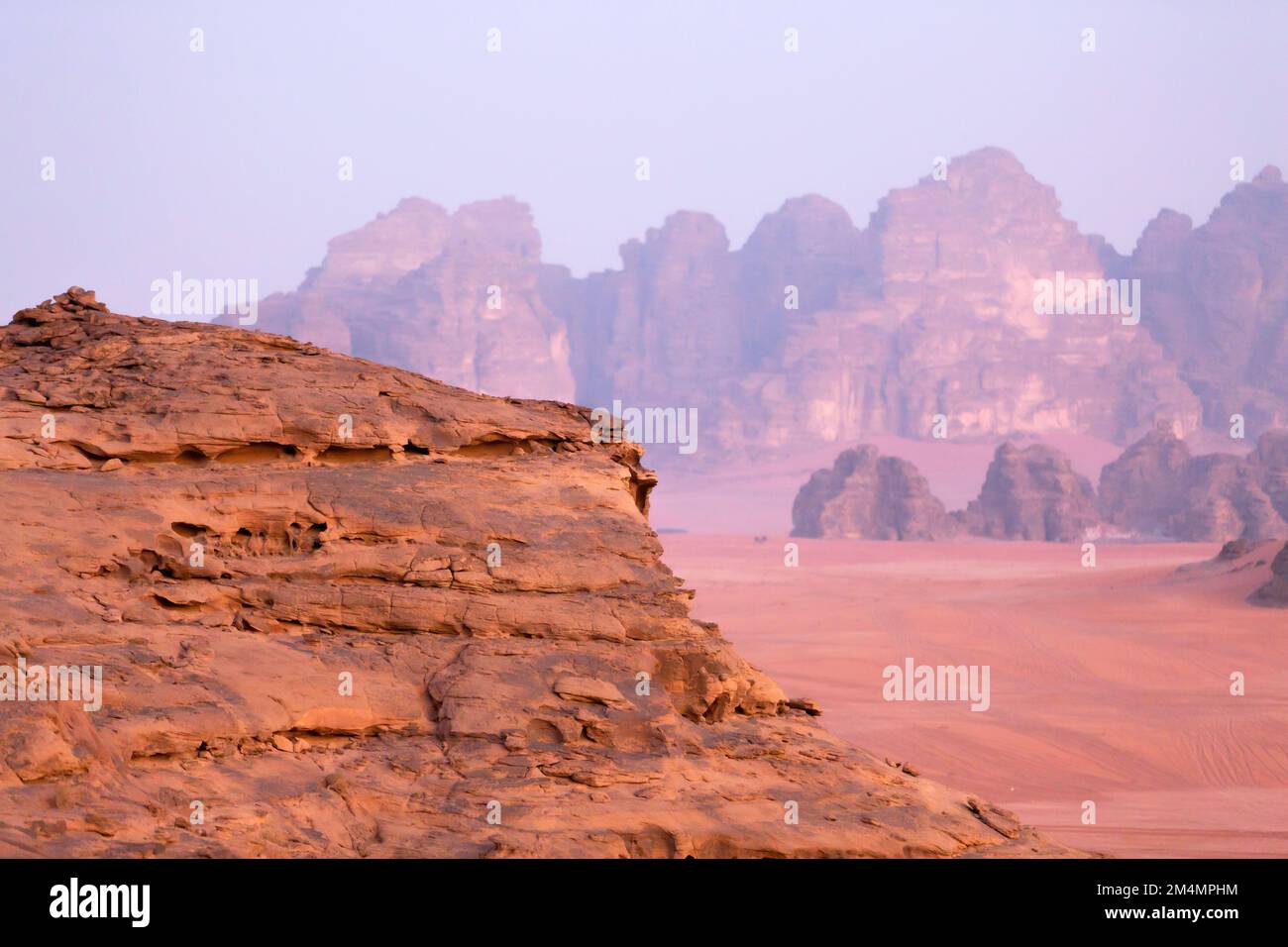 Wadi Rum, Jordan. The orange sand desert landscape and Jabal Al Qattar ...