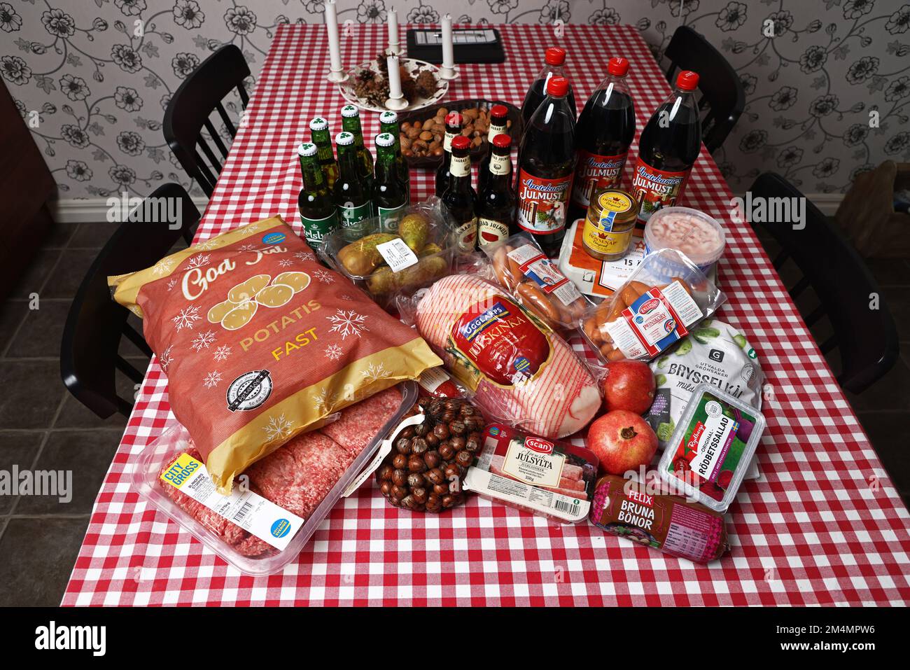 Christmas food from a grocery store, photographed on a kitchen table in ...