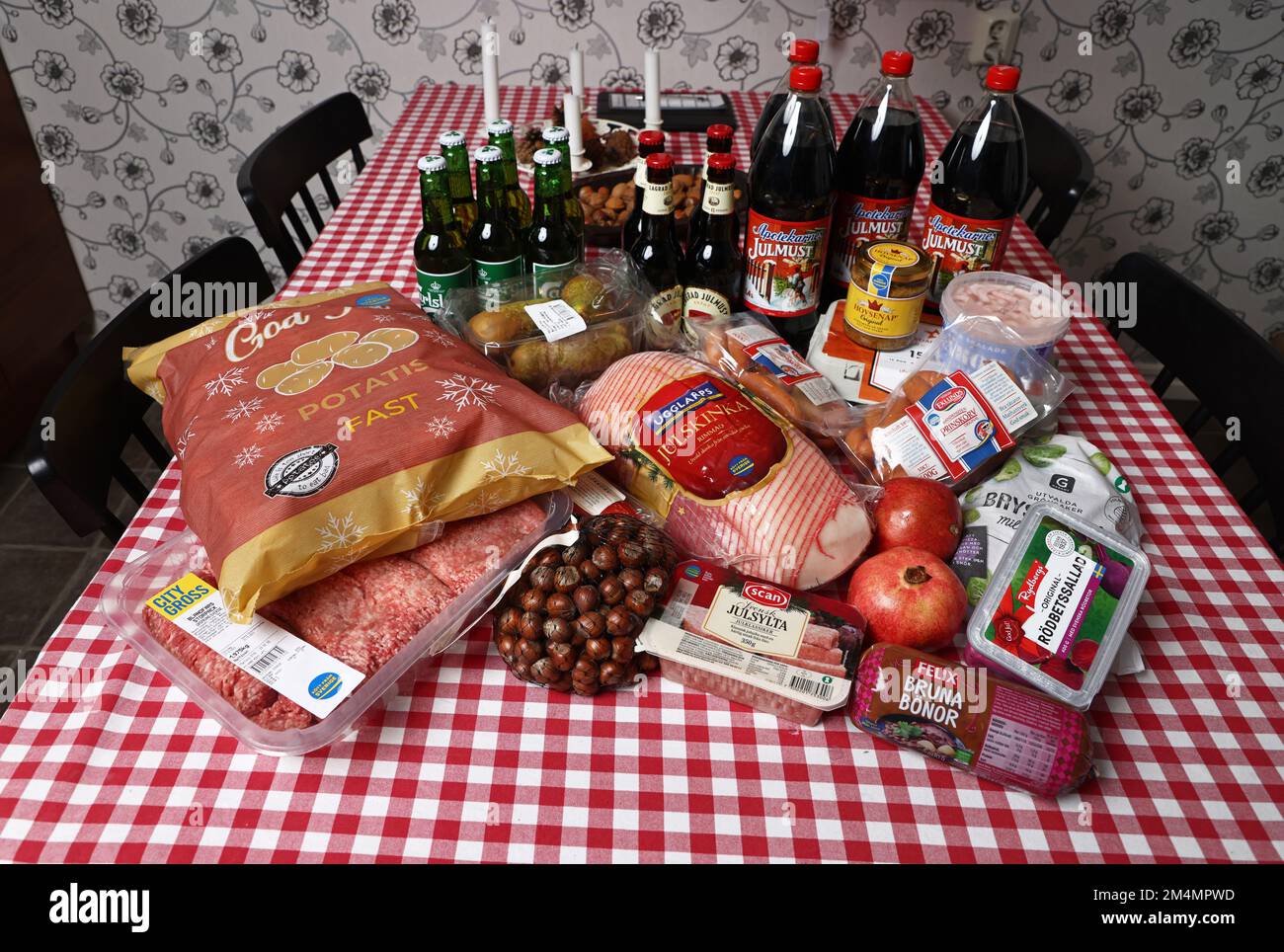 Christmas food from a grocery store, photographed on a kitchen table in ...