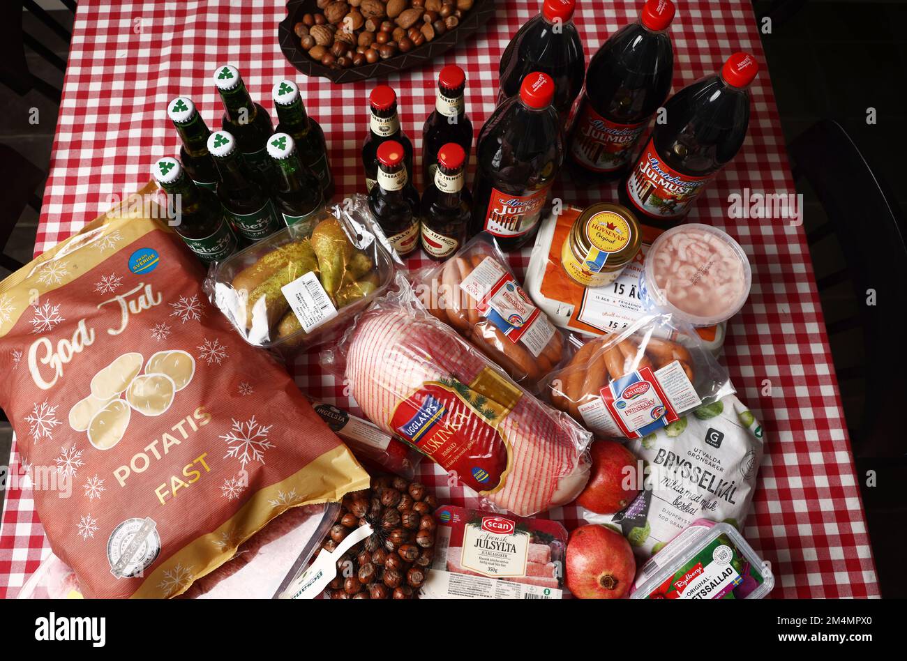 Christmas food from a grocery store, photographed on a kitchen table in ...