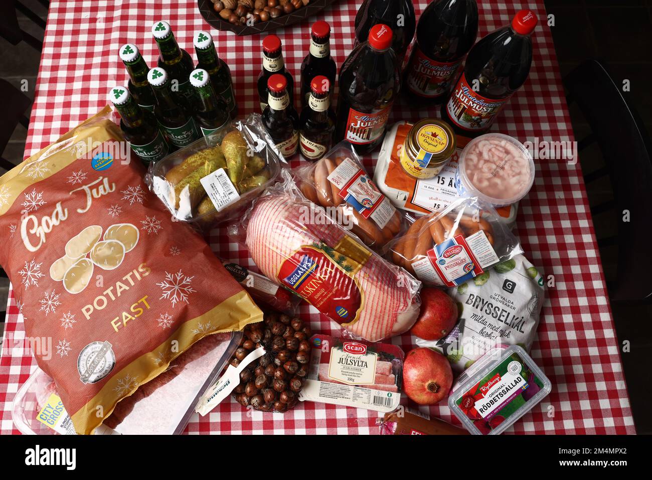 Christmas food from a grocery store, photographed on a kitchen table in ...
