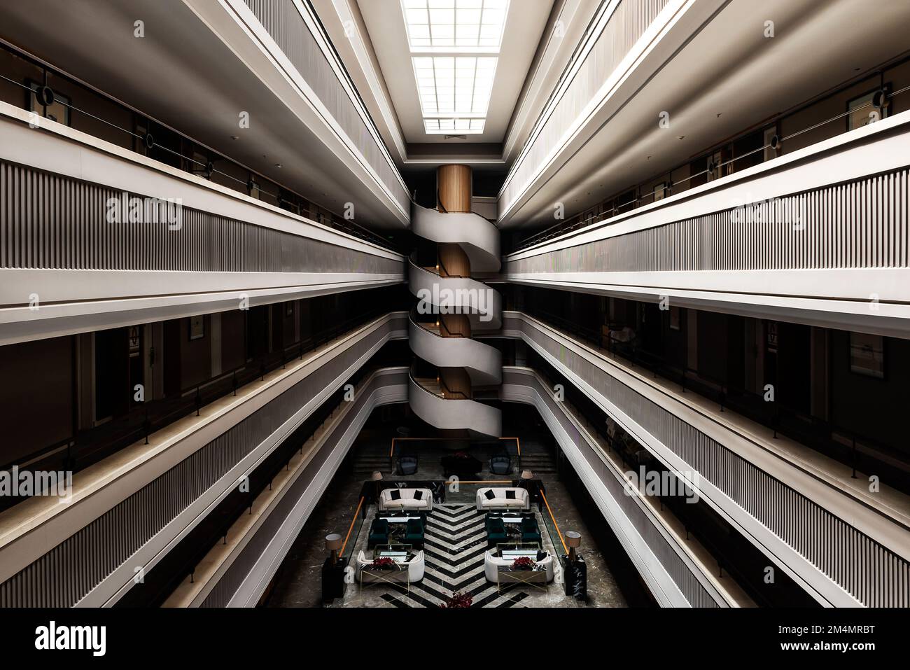 Interior design of large modern luxury hotel lobby with seating area ...