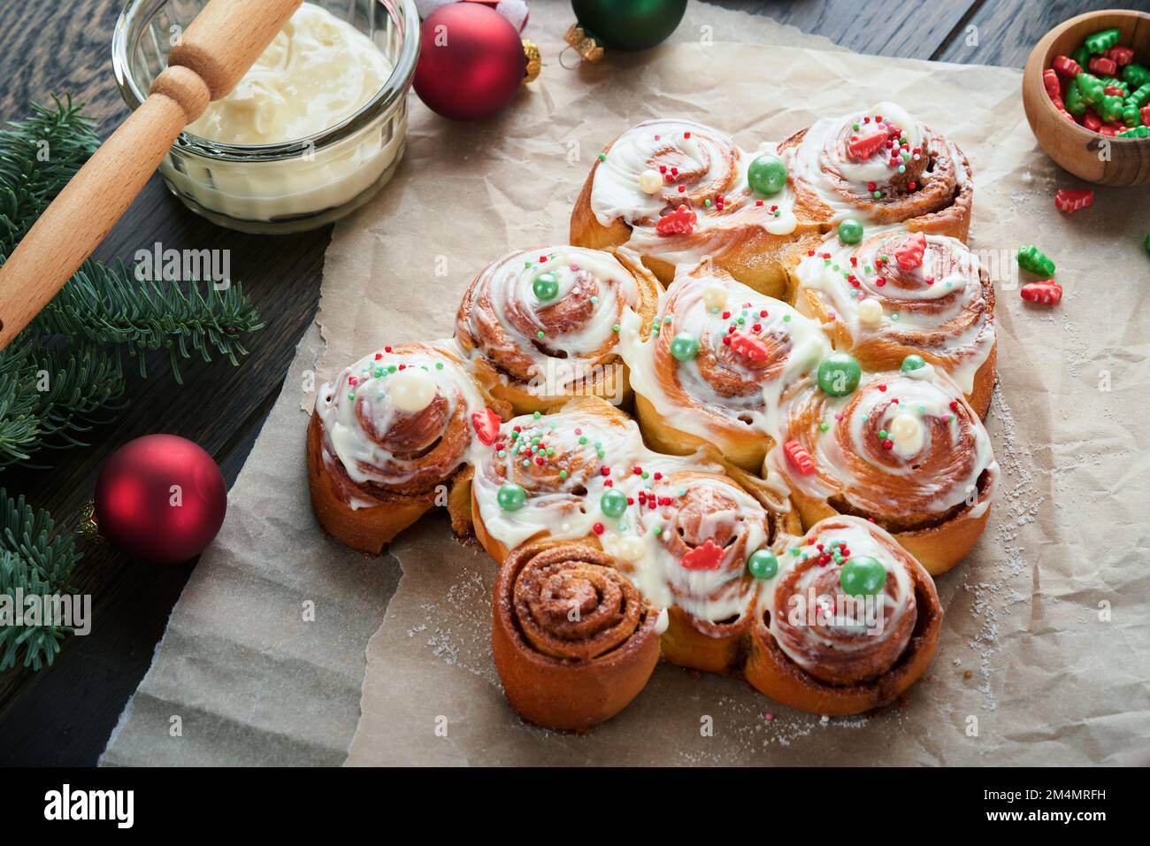 Christmas tree shape cinnamon rolls or cinnabon buns with cinnamon and ...