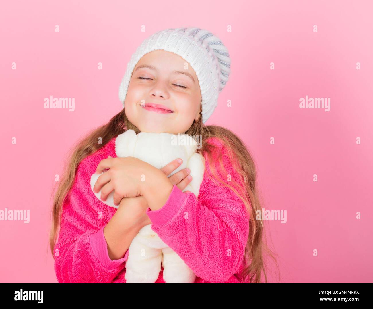 Child small girl playful hold teddy bear plush toy. Unique attachments ...