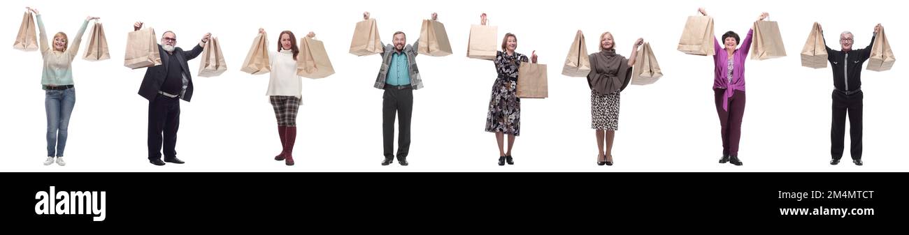 a group of people are running paper shopping bags Stock Photo - Alamy