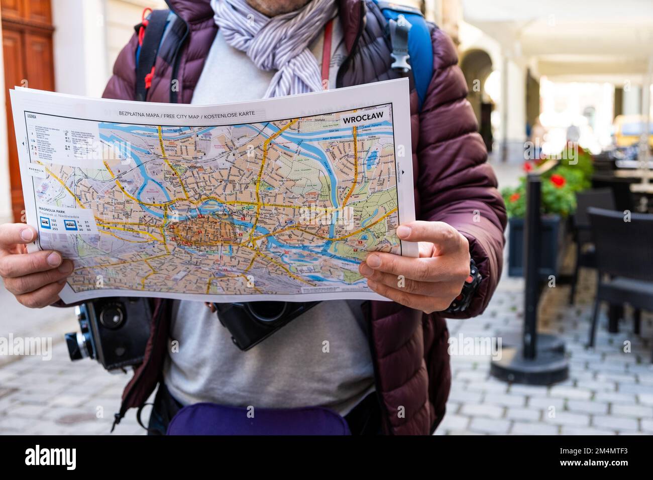 Wroclaw, Poland - September 27, 2019: Male traveler holding tourist map ...